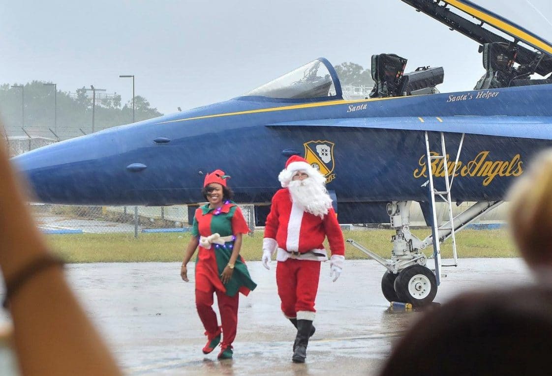 Santa Claus Delivers Holiday Cheer To America's Military Bases
