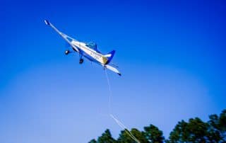 WATCH: Towing An Aerial Banner Is Not For The Faint Of Heart